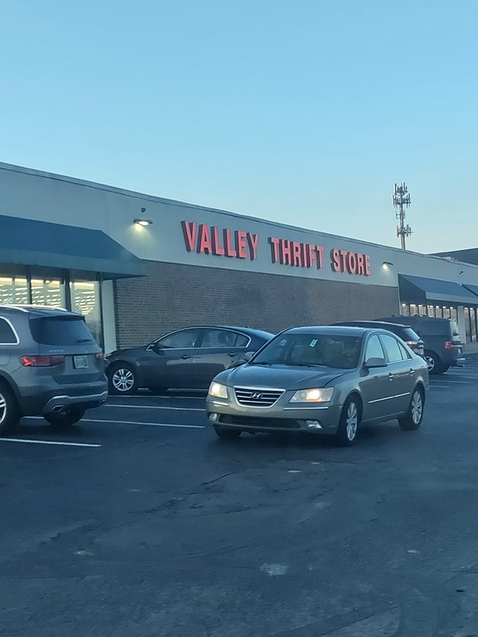 As the sun sets, Valley Thrift's sign glows with promise – tomorrow's inventory will be completely different, and that's the beautiful thrill of it all.