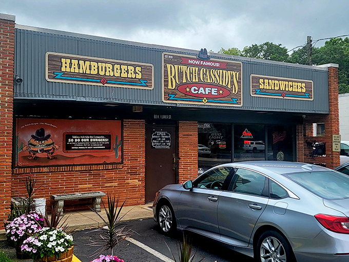 The exterior says "no-nonsense diner," but those flowers add a touch of "we care about the details"—just like their burgers.