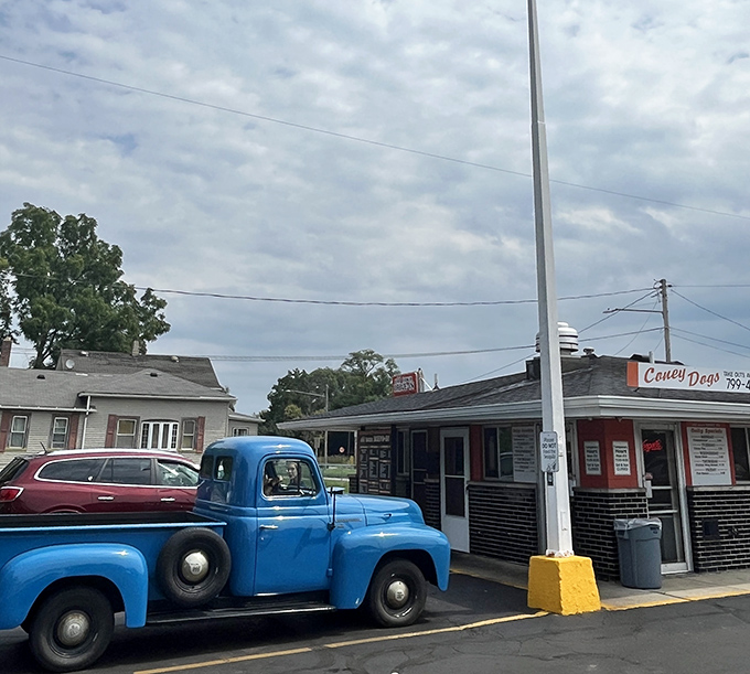 A classic blue pickup meets its spiritual counterpart in food form. Both are American icons built for function over flash, delivering reliable satisfaction every time.