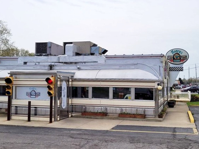 The classic diner silhouette against an Ohio sky—a stainless steel beacon for hungry travelers and locals who know that some treasures don't need fancy packaging.