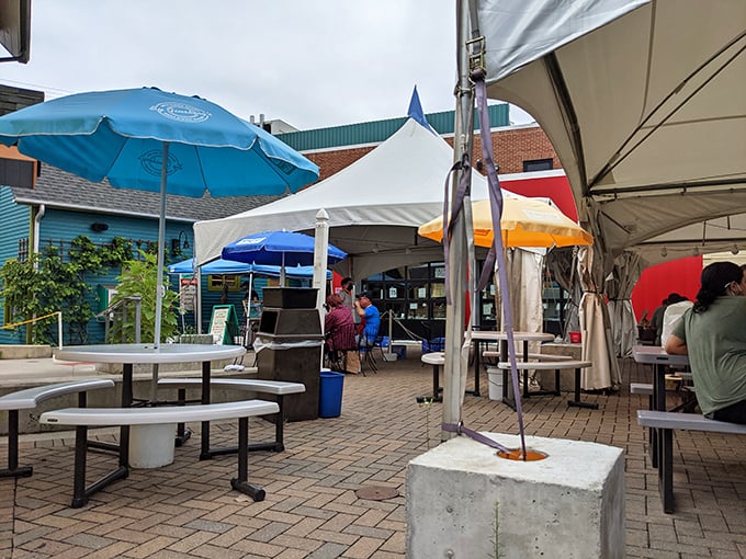 Outdoor seating under blue umbrellas offers a chance to enjoy your sandwich masterpiece while participating in Ann Arbor's favorite spectator sport: people-watching.