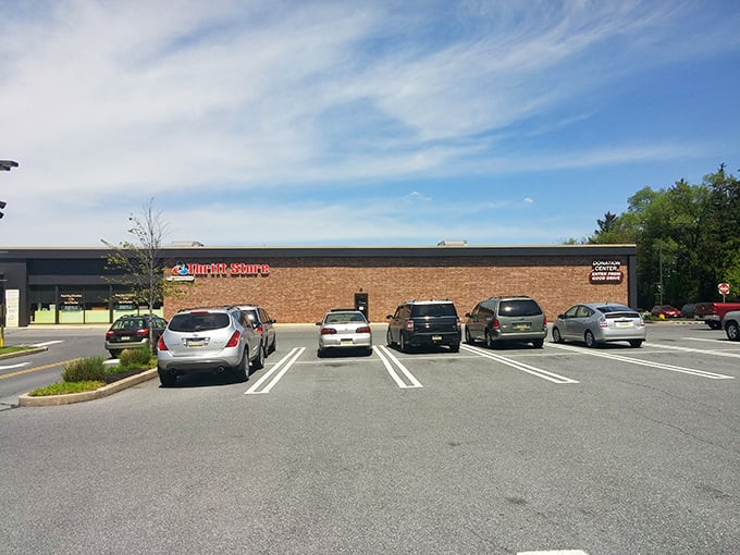 The parking lot fills quickly on weekend mornings—savvy shoppers know that early birds catch the best secondhand worms at CommunityAid.