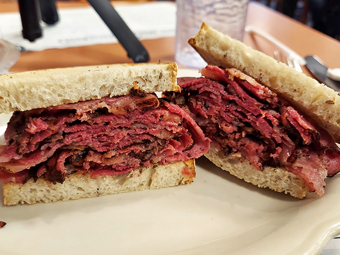 This pastrami sandwich isn't just lunch – it's a religious experience. Pink, peppery perfection piled high between slices of rye bread.