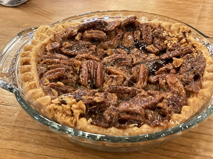 This isn't just pecan pie—it's what happens when pecans throw a party and invite chocolate chips to dance on a buttery crust.