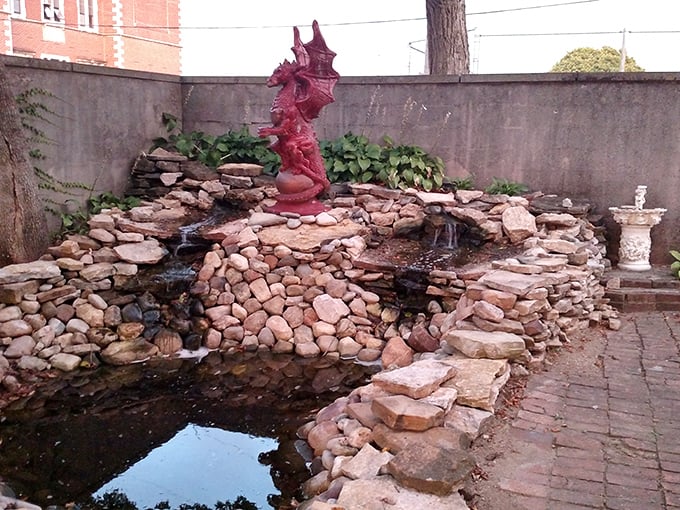 Even the garden embraces the fantasy with a dragon-topped fountain—proof that whimsy extends beyond the castle walls.