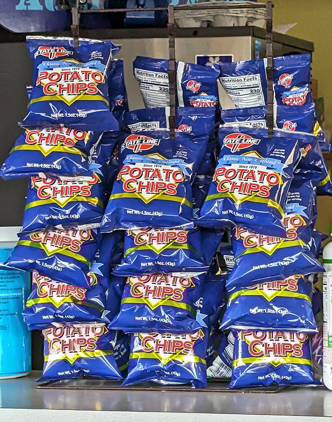 The chip display – because sometimes you need a crunchy sidekick for your main event. No artisanal kettle-cooked nonsense, just reliable satisfaction.