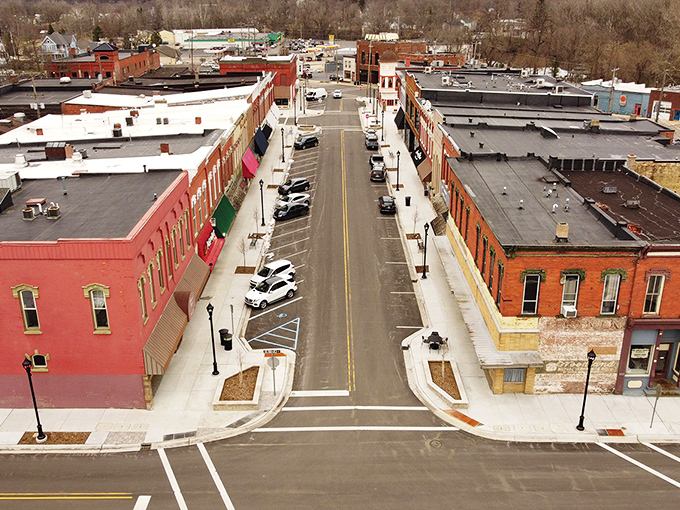 Downtown Allegan from above reveals the perfect grid of a thoughtfully planned small town – where history and modern life coexist in brick-lined harmony.