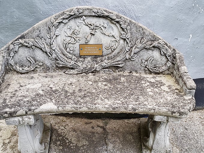 This ornate stone bench offers weary travelers a moment to sit and contemplate life's big questions—like why more buildings aren't shaped like breakfast items.