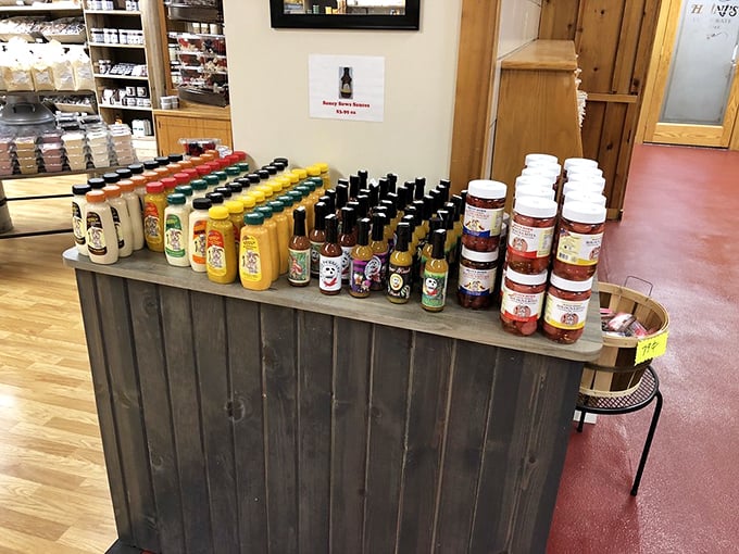 A rainbow of sauces and condiments that promise to transform ordinary meals into extraordinary experiences. That's not just BBQ sauce—it's liquid magic.