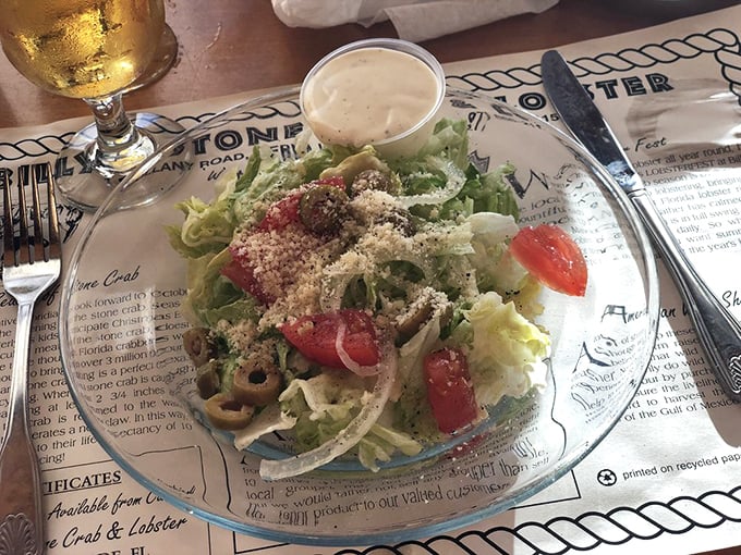 A side salad that knows its role—fresh, crisp supporting actor in the blockbuster seafood drama unfolding on your table.