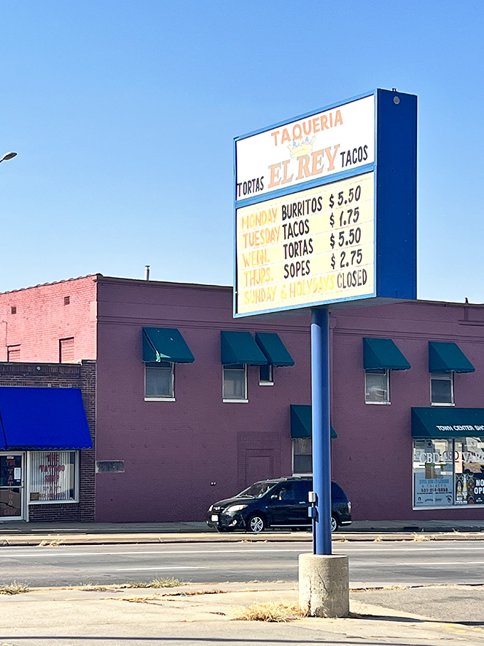 The roadside sign announces daily specials like a town crier of deliciousness—a beacon for hungry travelers and locals alike.