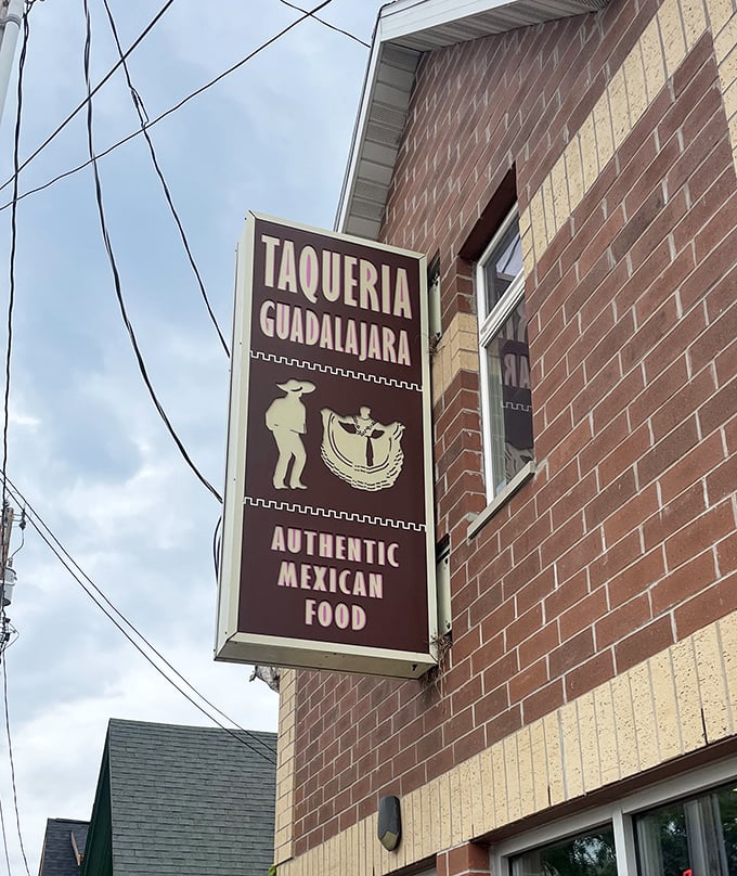 The sign promises "Authentic Mexican Food" without fanfare or gimmicks – like a confident person who doesn't need to brag. They let the food do the talking.