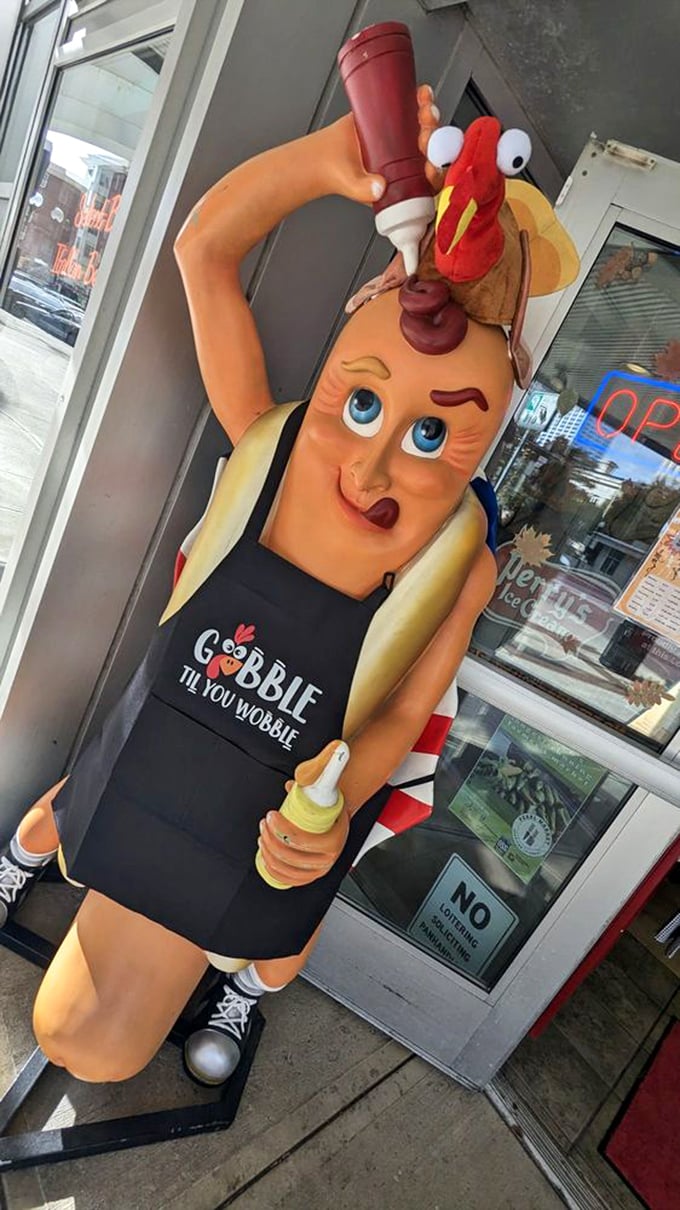 "Gobble 'Til You Wobble" warns the apron on this hot dog mascot, standing tall as Columbus's unofficial ambassador of frankfurter fun.