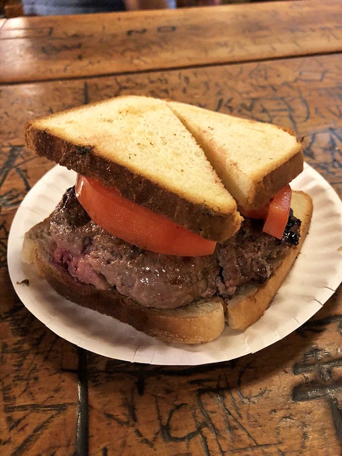 The burger in its natural habitat—simple, unadorned, and perfect. No filters needed when the subject is this photogenic and delicious.