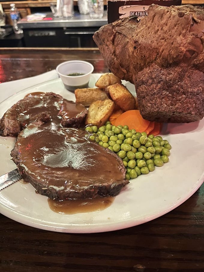 The Sunday roast—a magnificent mountain of meat, Yorkshire pudding, and gravy. This isn't just dinner; it's a British institution on a plate.