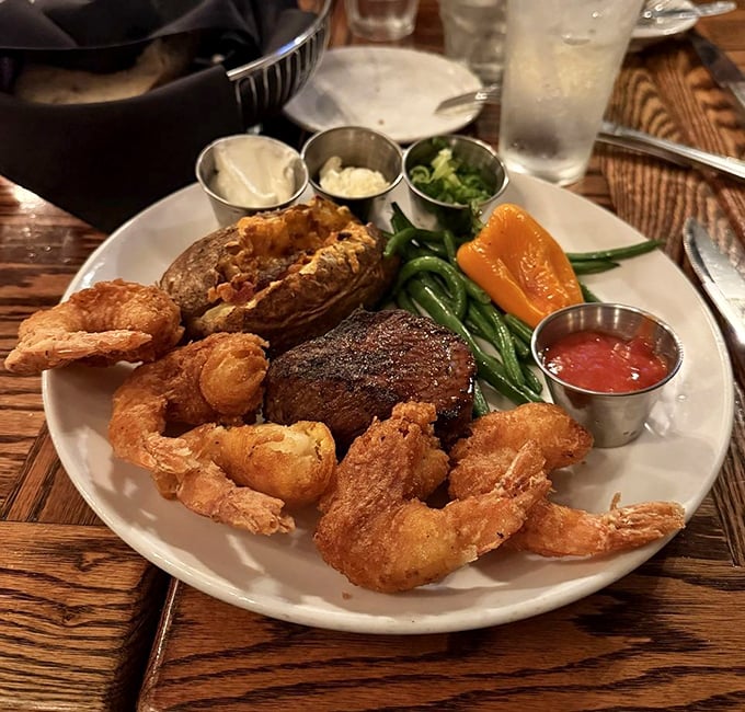 Land meets sea in perfect harmony – golden fried shrimp and a tender steak create the ultimate "why choose when you can have both?" moment.