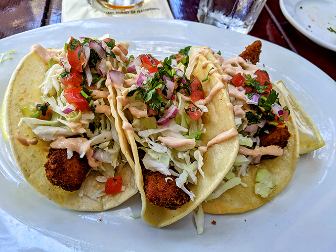 These aren't just fish tacos—they're crunchy, creamy symphonies of texture wrapped in warm tortillas, waiting to transport you to coastal bliss.