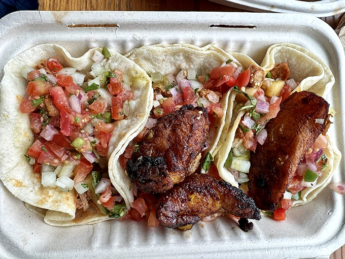 Taco perfection: tender, seasoned meat nestled in soft corn tortillas, topped with fresh pico de gallo—simple, authentic, and utterly delicious.