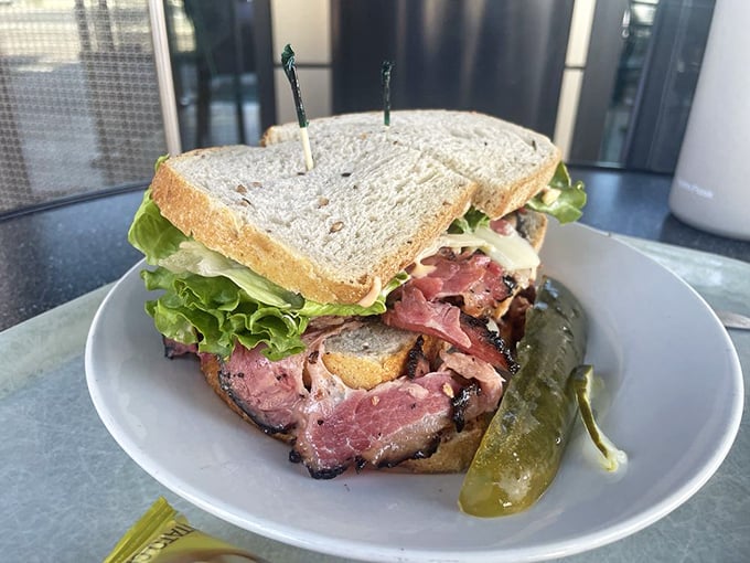 The Triple Decker – not just a sandwich but an engineering marvel. Layers of meat and cheese create a skyscraper of flavor that demands respect.