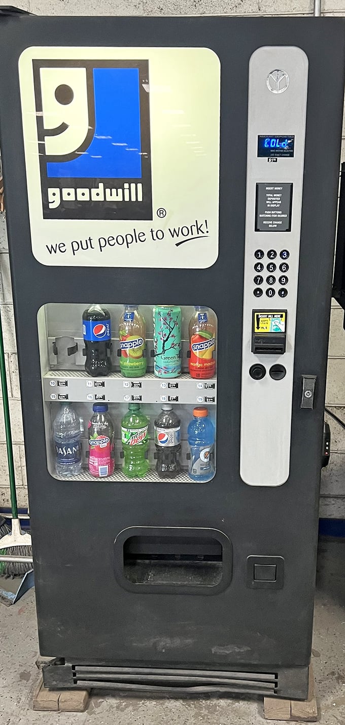 Even the vending machine sports the Goodwill smile. Hydration break before diving back into the blue bin treasure hunt!