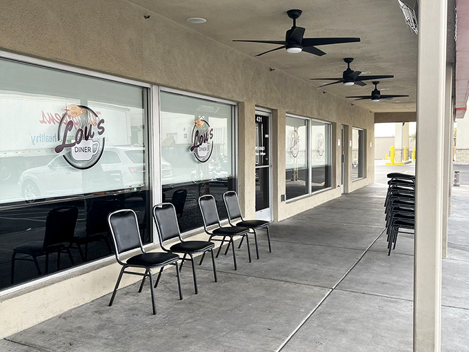 The waiting area outside Lou's speaks volumes – simple chairs where hungry patrons patiently anticipate meatloaf worth every minute of waiting.