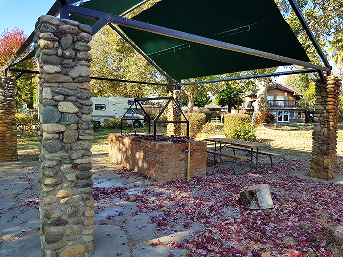 This stone barbecue area at Willow Point isn't just functional—it's where camping memories are forged alongside perfectly charred hot dogs and s'mores.