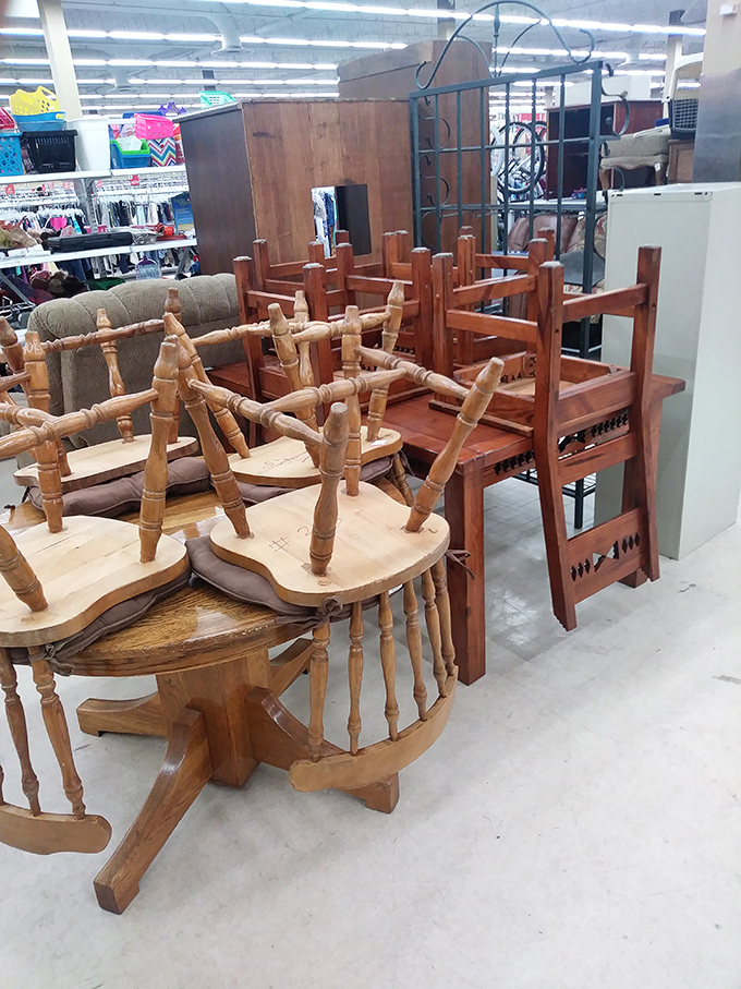 The wooden chair congregation—where dining sets have disbanded but each piece stands ready for adoption into your eclectic home collection.