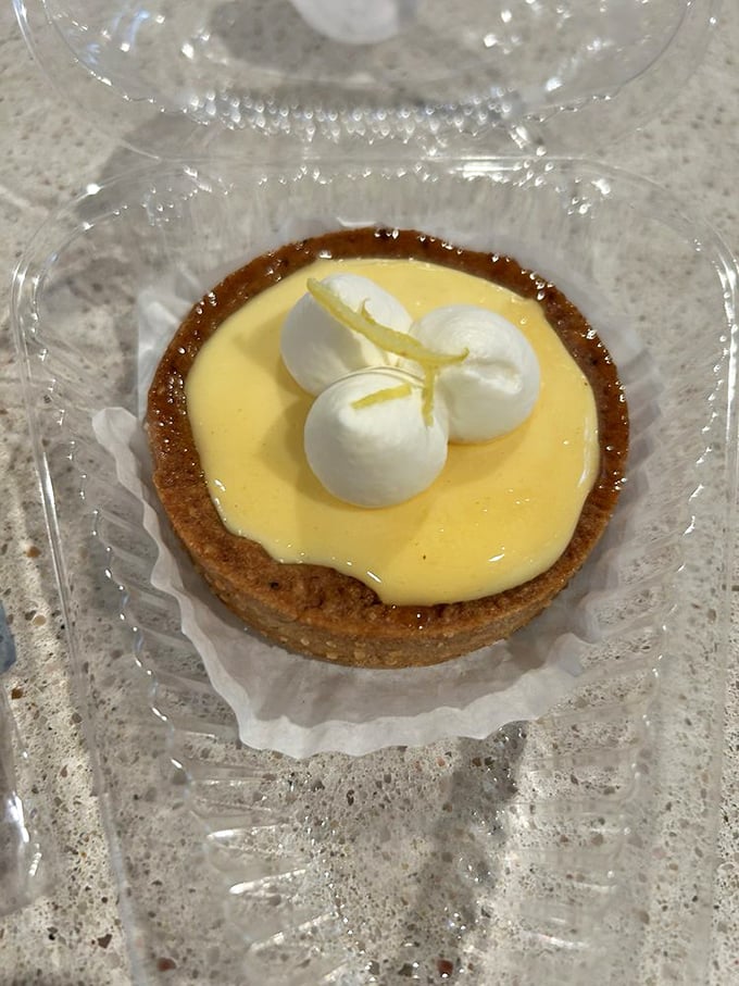 The yuzu tart balances sweet, tart, and creamy in three perfect bites—like a haiku you can eat instead of read.