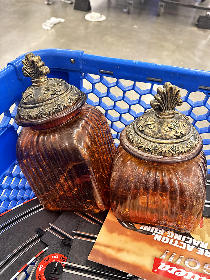 Amber glass containers with ornate lids—once holding someone's sugar and flour, now ready to become another kitchen's conversation piece.