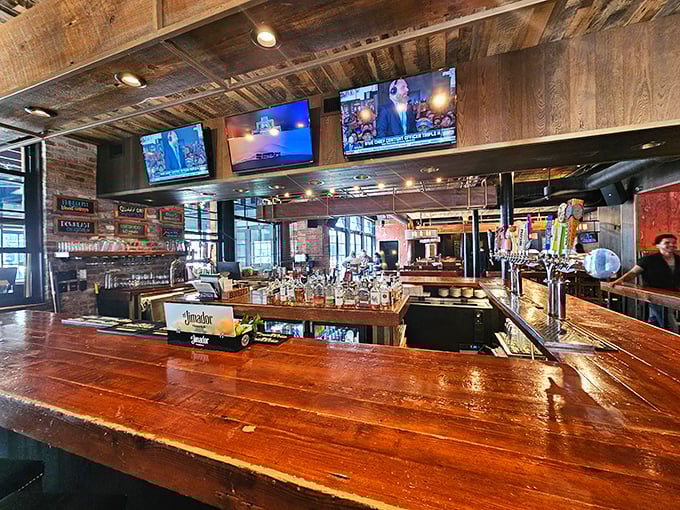A bar counter that's witnessed countless first dates, celebrations, and "just one more" promises. Wood worn smooth by stories and spilled bourbon.