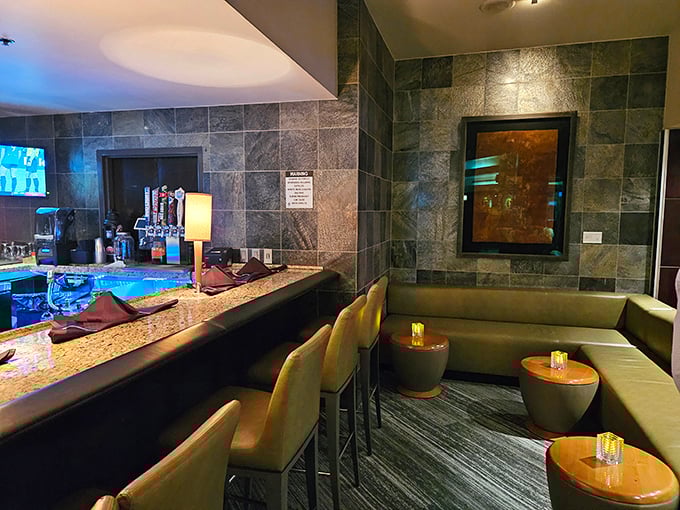 The lounge corner where many great decisions are made—like ordering another round or deciding that two desserts is completely reasonable.
