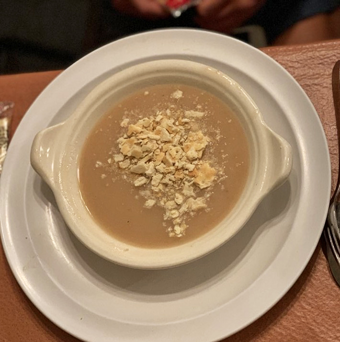 Bean soup topped with crumbled crackers—the humble beginning of an extraordinary meal. This starter sets the tone for homestyle perfection.