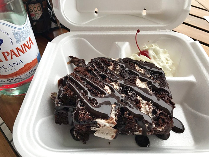 Chocolate cake that's dressed for a night out. The drizzle of sauce is like jewelry for dessert—completely unnecessary but absolutely essential.