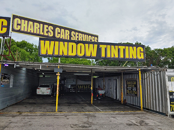 Automotive services nestled among retail stalls—because in Florida, your car's comfort is as important as your own in the relentless sunshine.