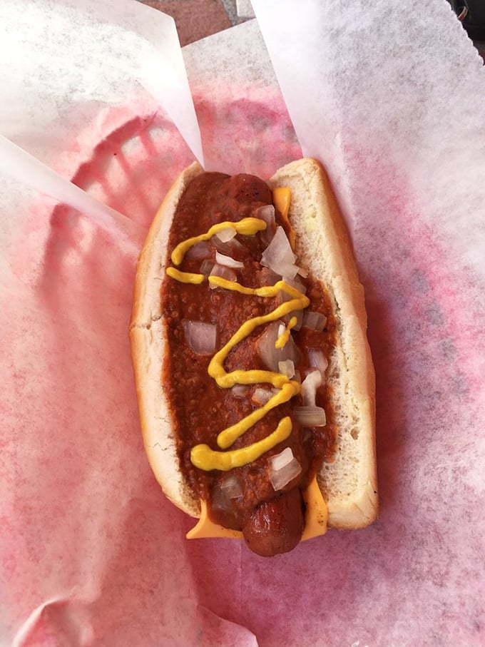 The chili cheese dog—where beef meets more beef in a relationship sealed with cheese. Some call it messy; I call it magnificent.
