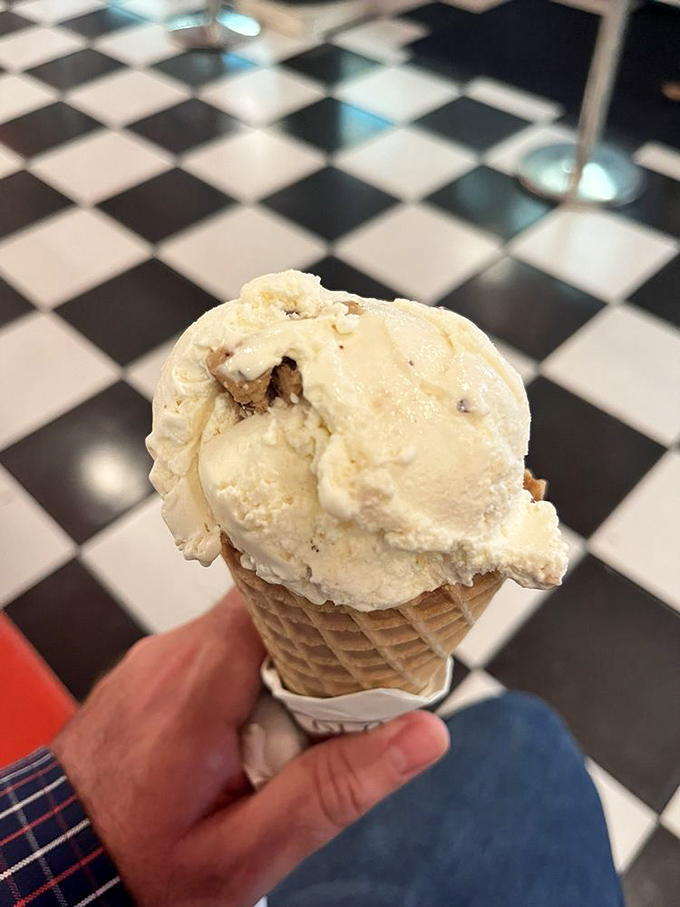 Vanilla studded with mysterious treasures—could be cookie dough, could be happiness in solid form—either way, it's disappearing fast.