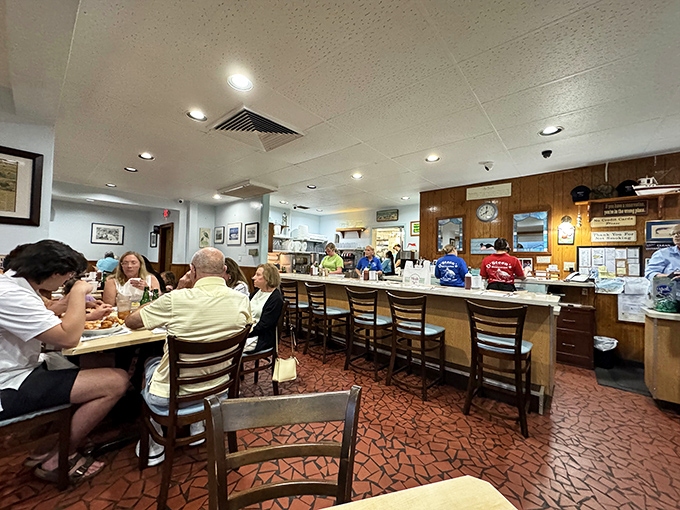 Counter seating: where solo diners become part of the O'Steen's family and seafood secrets are shared between bites.
