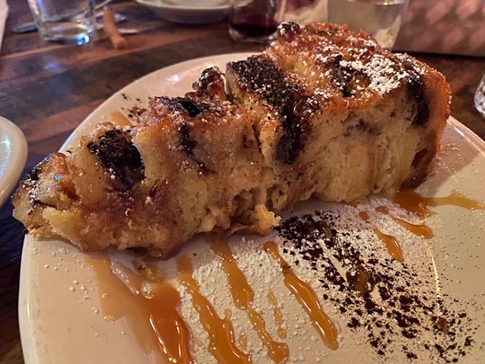 This bread pudding doesn't just end your meal—it provides closure, sweet satisfaction, and a compelling reason to loosen your belt another notch.