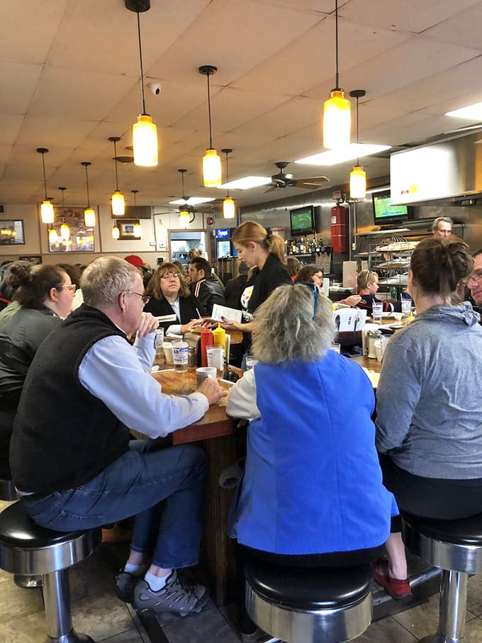 The counter at Hamburger Inn isn't just where food is served—it's where stories are exchanged, friendships are formed, and community happens over coffee.