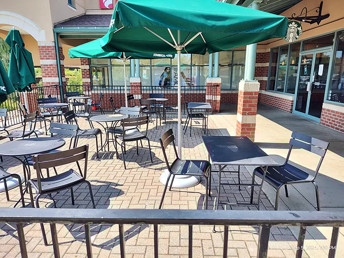 The café's umbrella-shaded tables offer a civilized respite for refueling discussions about which stores to hit next and comparing the day's bargain victories.