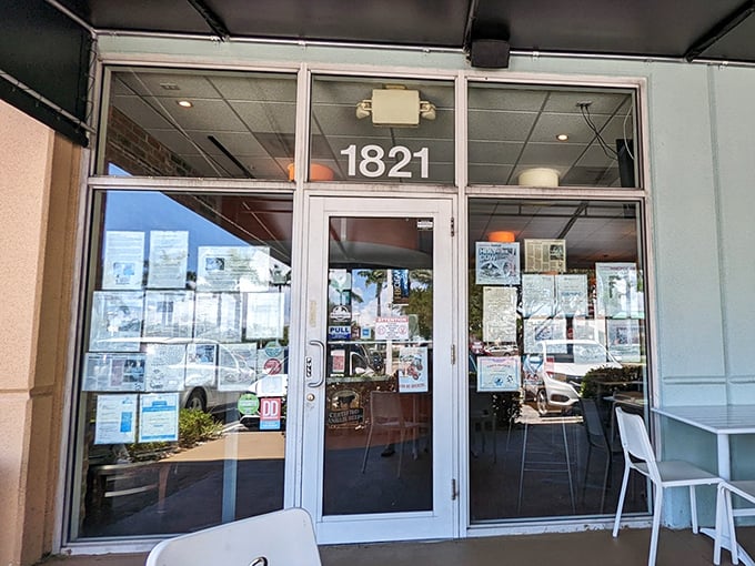 The entrance—unassuming yet inviting. Behind this glass door lies a world where calories don't count and burger dreams come true.