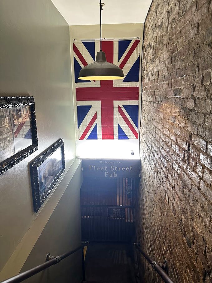 Descend these stairs and leave Tennessee behind. The Union Jack flag signals you're entering international waters—passport and appetite required.