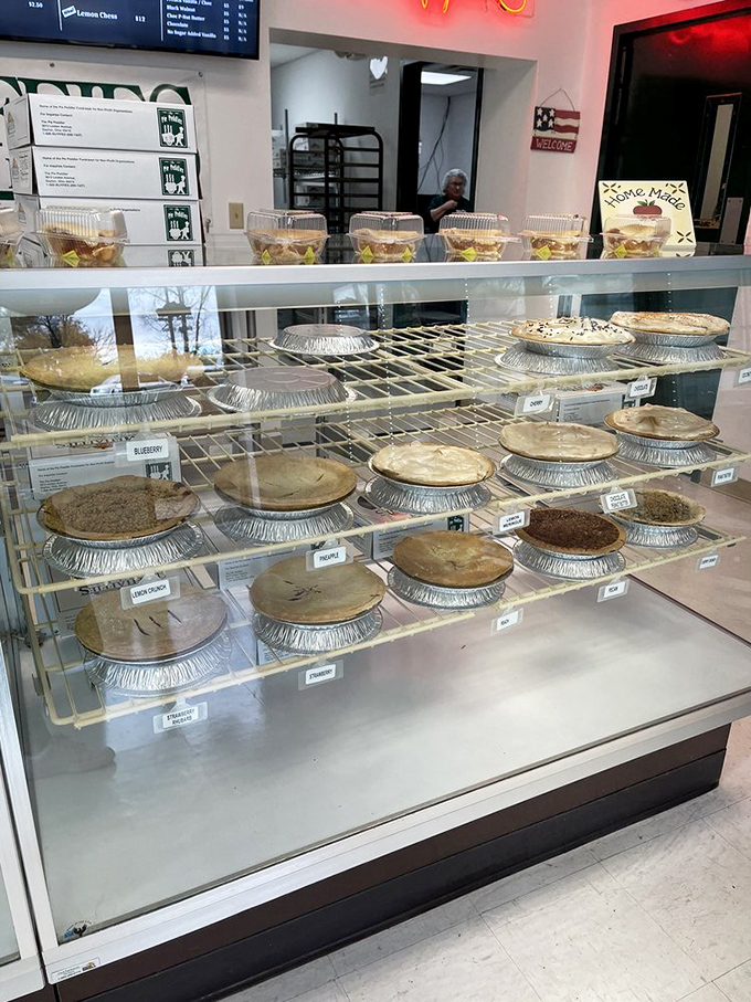 The display case at Mehaffies isn't just a refrigerator – it's a museum of edible art where every pie deserves its own velvet rope and security guard.