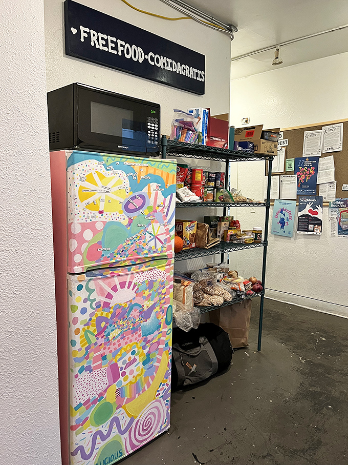 The colorfully decorated "Free Food" pantry reveals the heart behind this business—proving that the best establishments nourish both body and community.