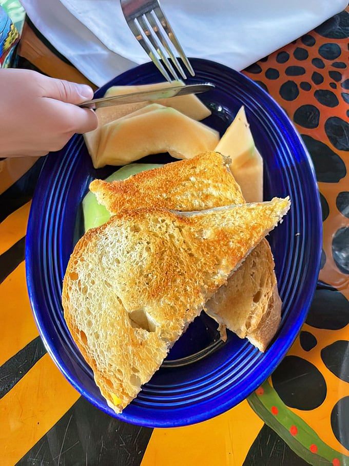 Grilled cheese elevated to art form—golden, crispy, and promising the kind of melty interior that haunts your cheese dreams.