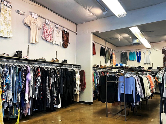 Organization is key – neatly arranged racks make browsing a pleasure rather than the overwhelming archaeological dig of typical thrift stores.