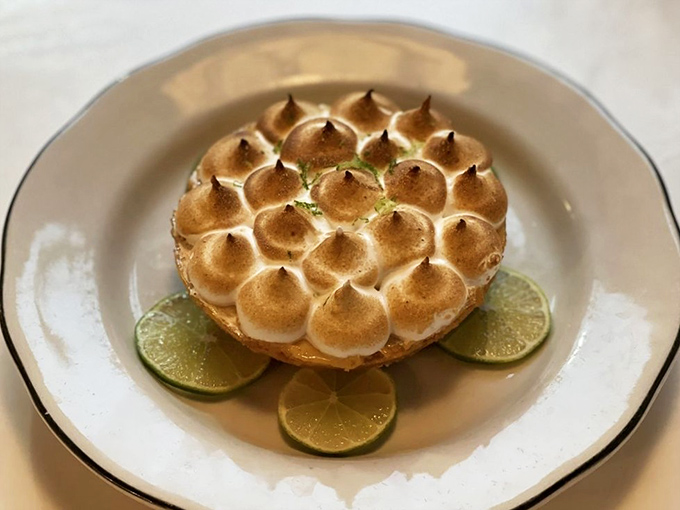 Key lime pie with torched meringue provides the perfect sweet finale to your oceanic culinary adventure.