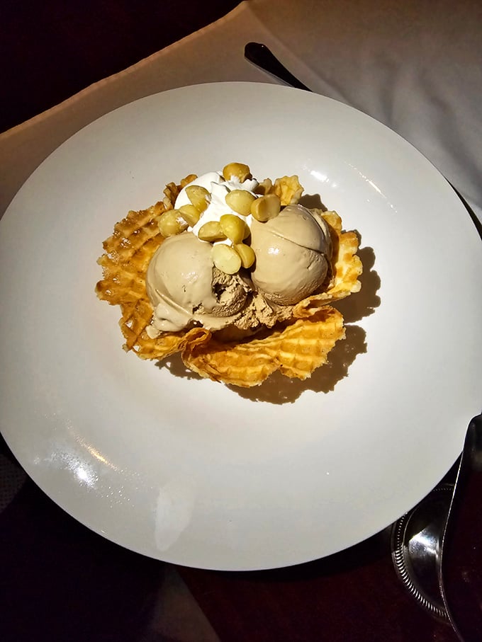 The macadamia nut sundae served in a waffle bowl—proof that Bern's takes dessert as seriously as steak. Sweet dreams are made of this.
