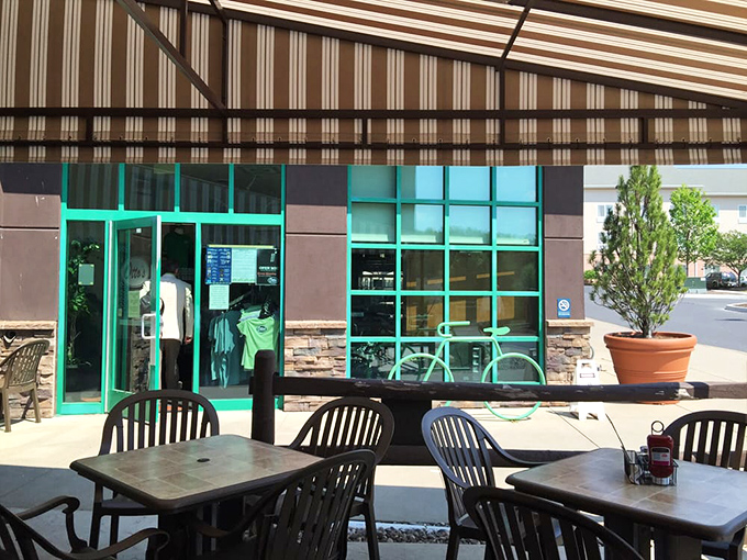 The outdoor seating area—where fresh air somehow makes everything taste better, especially when there's a cold brew involved.