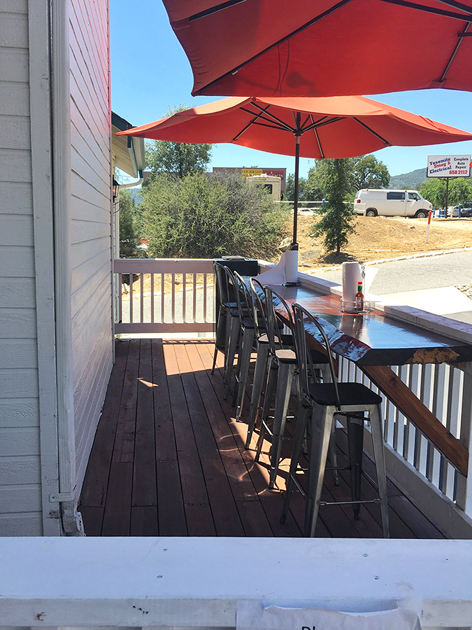 The outdoor seating area offers fresh air with your feast. Those umbrellas aren't just for shade—they're hiding spots from circling food-jealous birds.